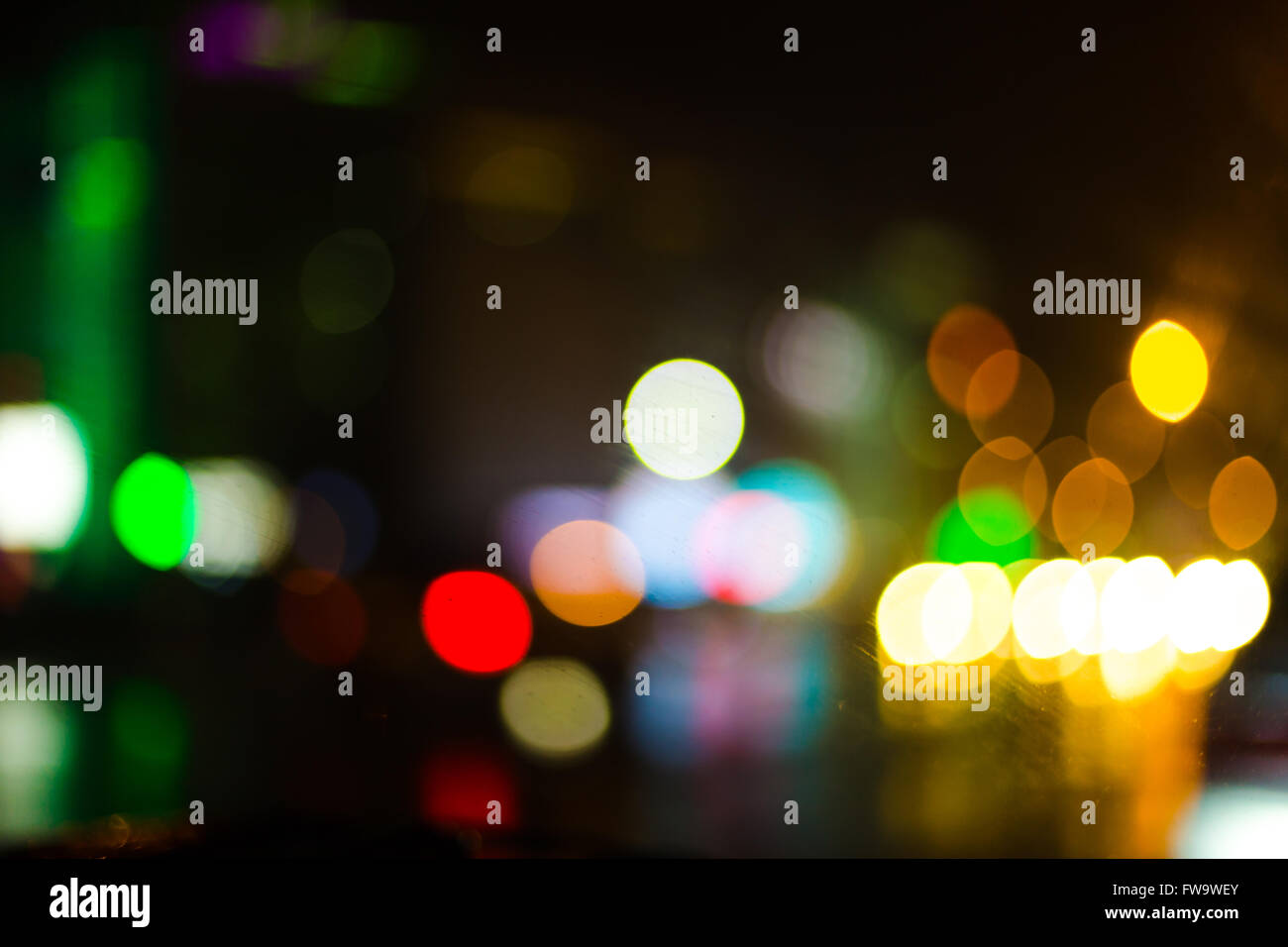 Colorful defocused bokeh lights background. City glare abstract ...