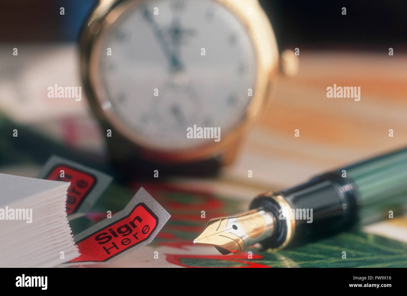 Close-up of a Document with "Sign Here" Stickers, a Fountain Pen and ...