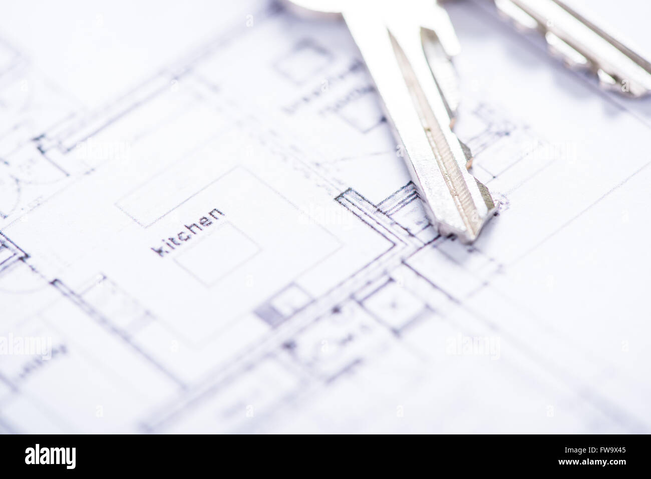 Selling house concept, architect drawings and keys Stock Photo - Alamy