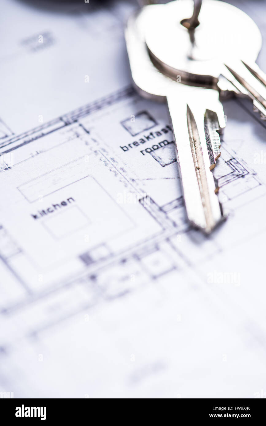 Selling house concept, architect drawings and keys Stock Photo - Alamy