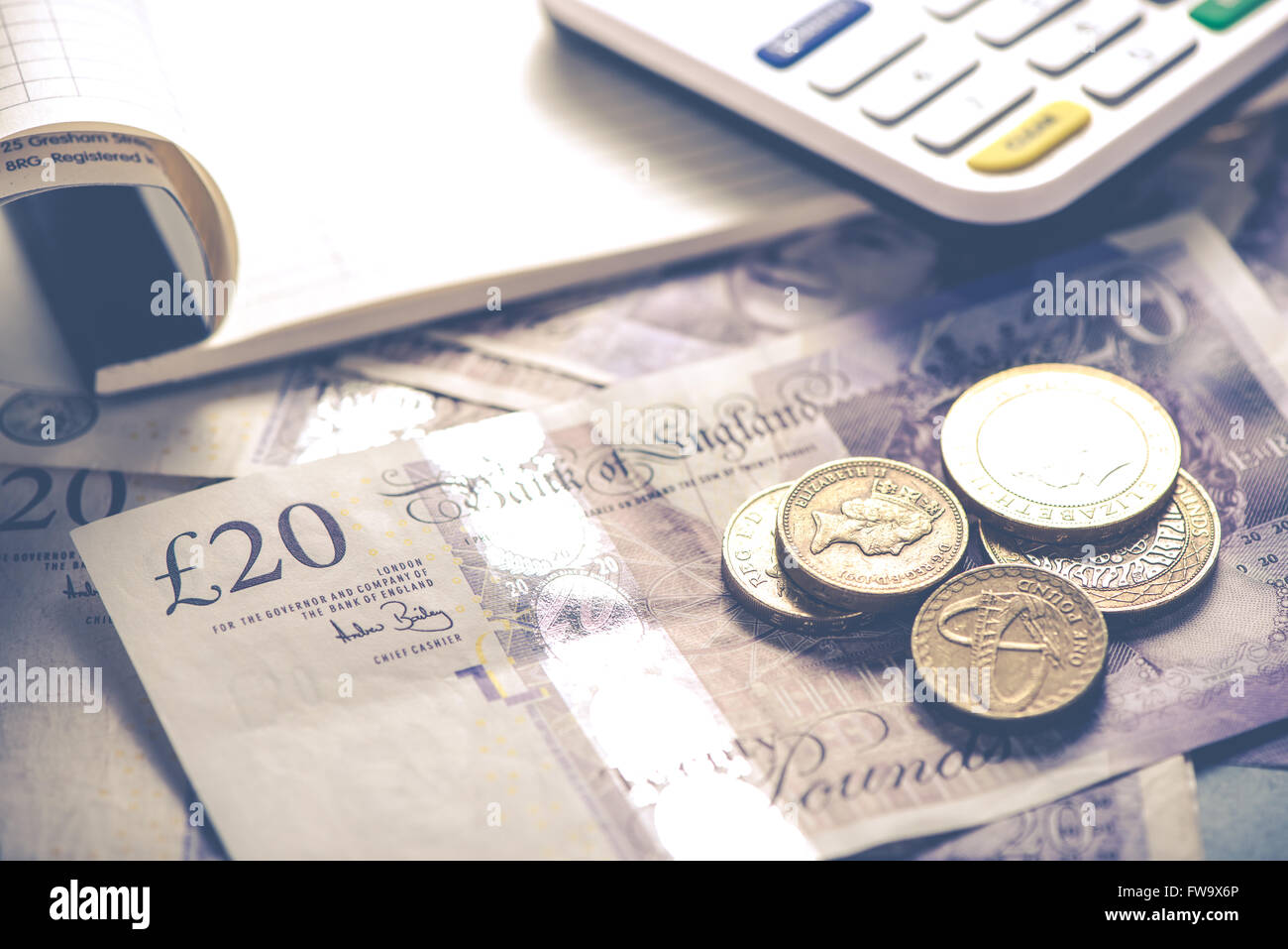 Twenty pound and fifty pound notes with one pound coins hi-res stock ...