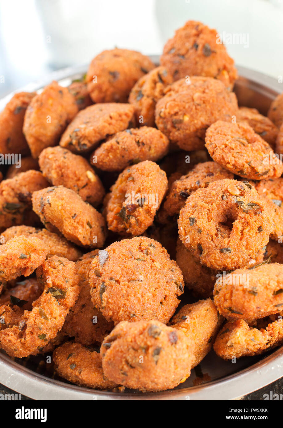 A bowl of gateaux piment, a popular savoury street food in Mauritius ...