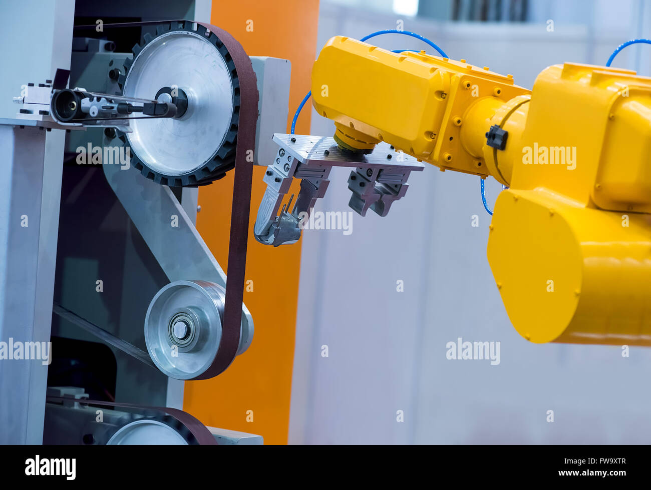 robotic hand machine tool at industrial manufacture factory Stock Photo ...