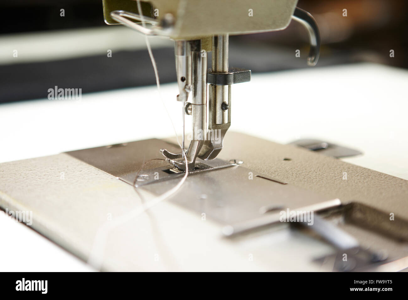 Sewing machine detail in warm tone. Horizontal format Stock Photo - Alamy