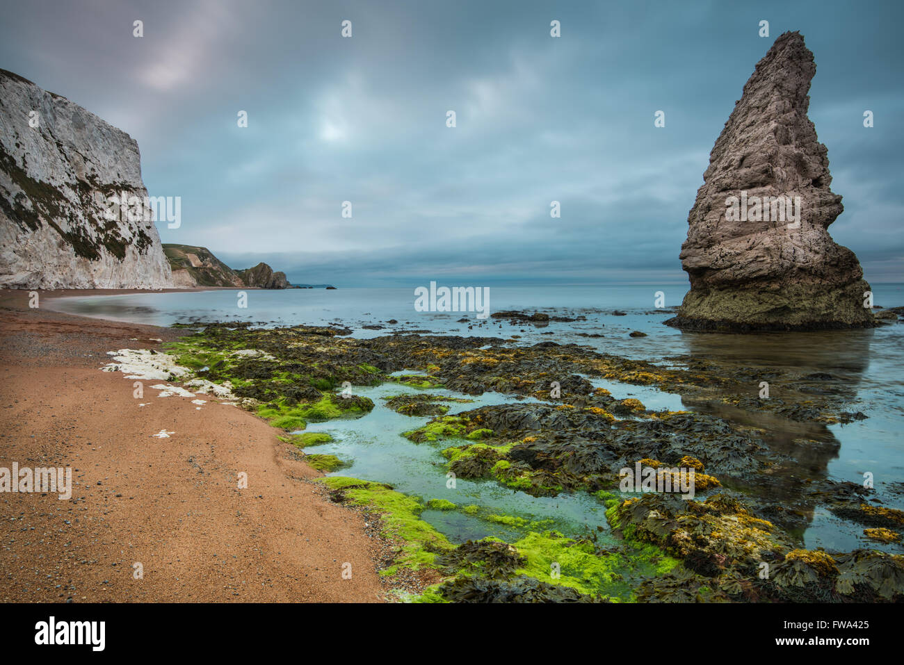 Rock formation at Jurrassic Coast beach in Dorset, UK, long exposure ...