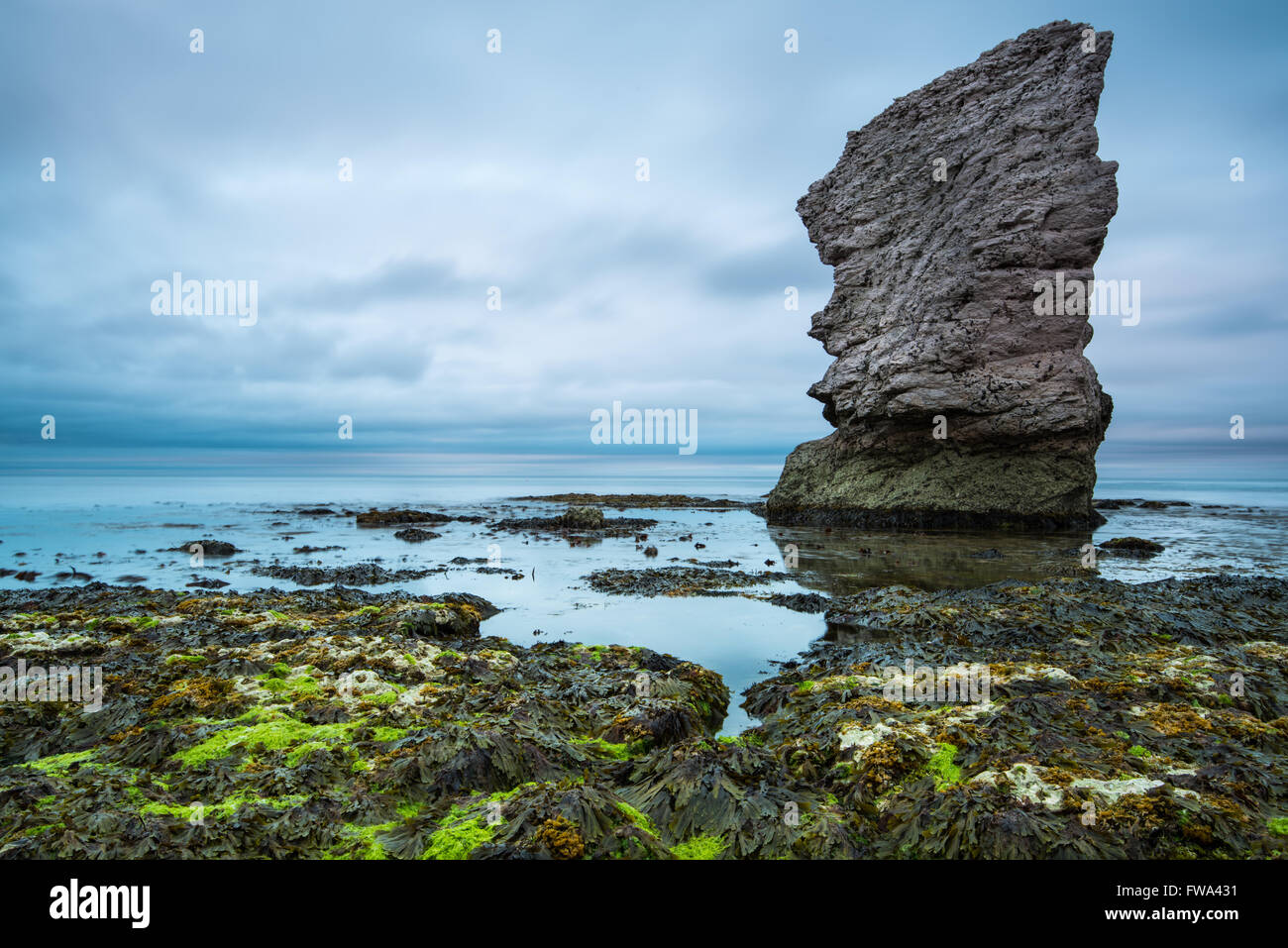 Rock formation at Jurrassic Coast beach in Dorset, UK, long exposure ...