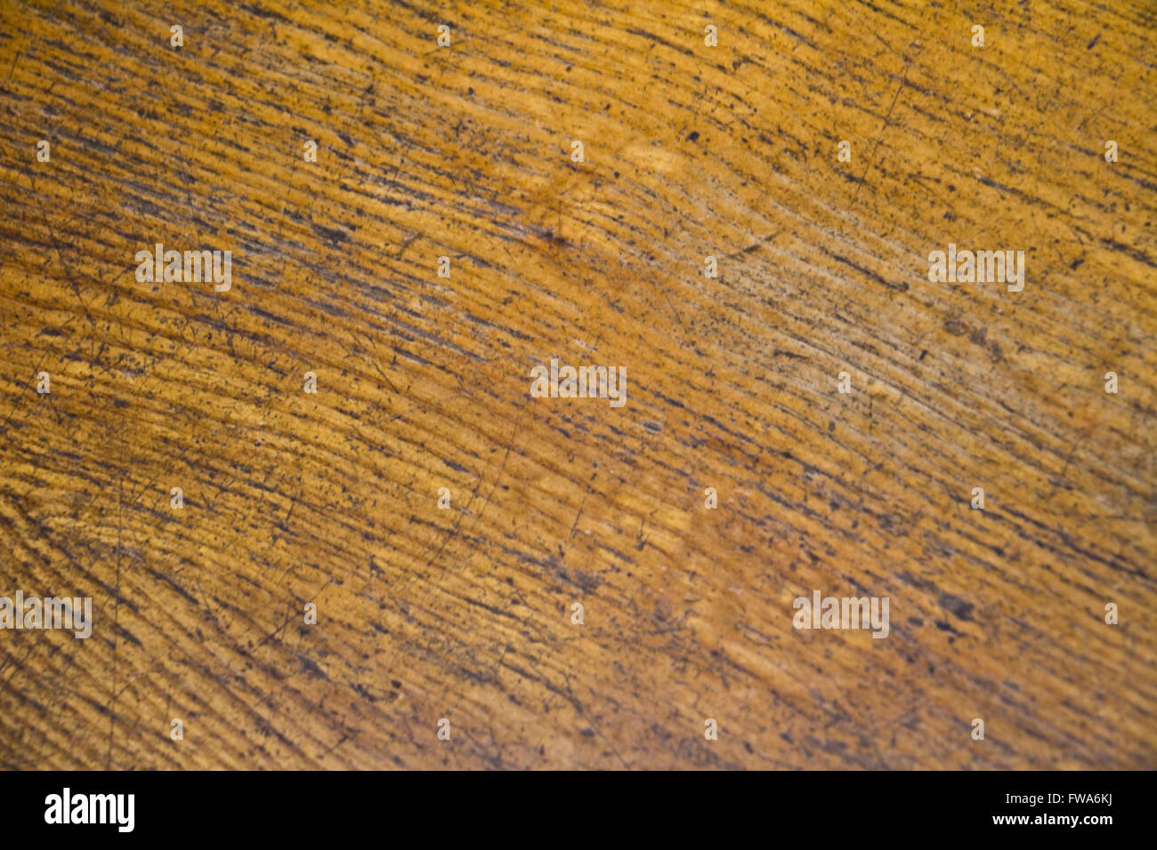 Old wooden table surface showing a well used texture Stock Photo - Alamy