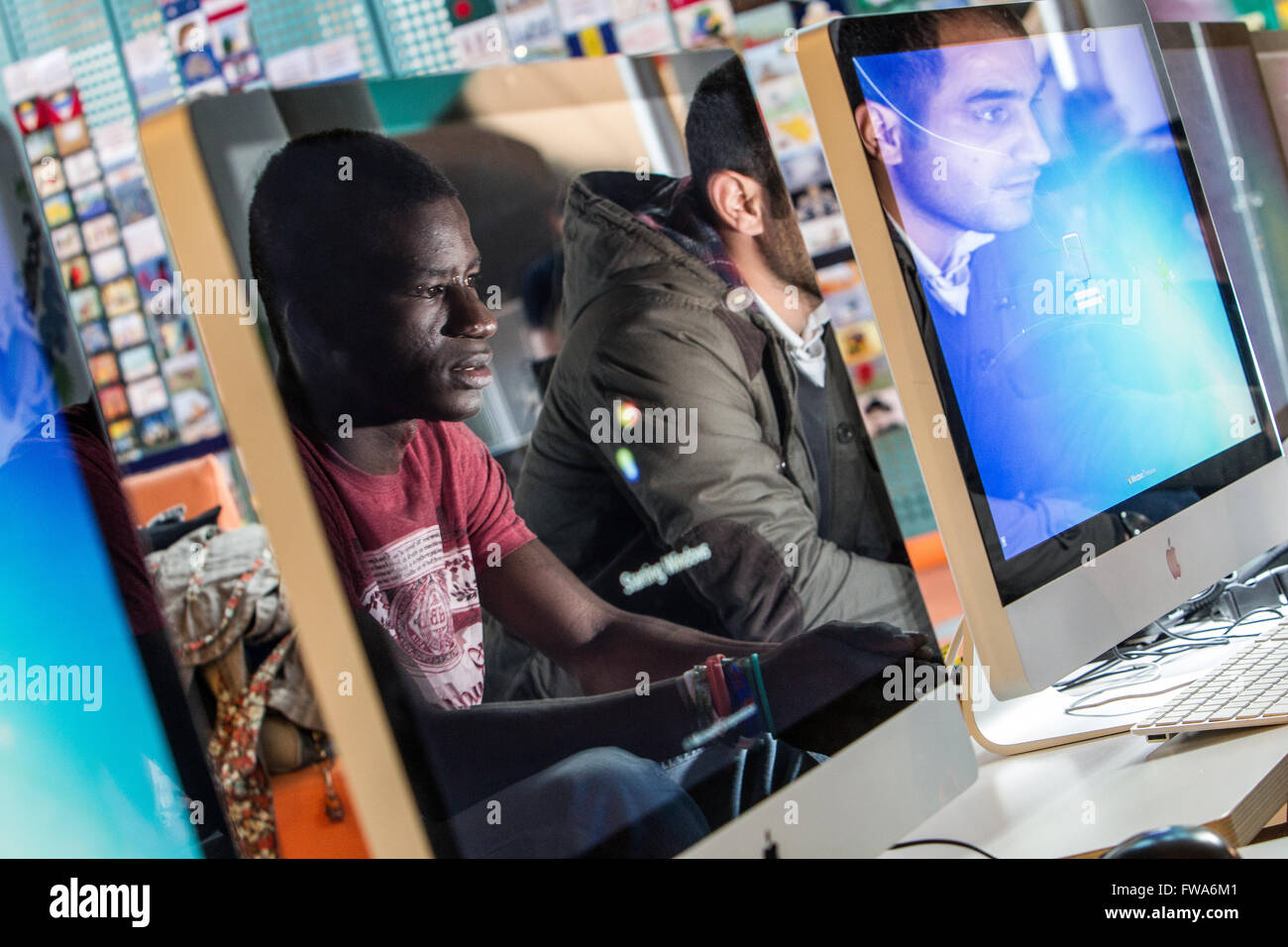 students reflected on computer screens Stock Photo - Alamy