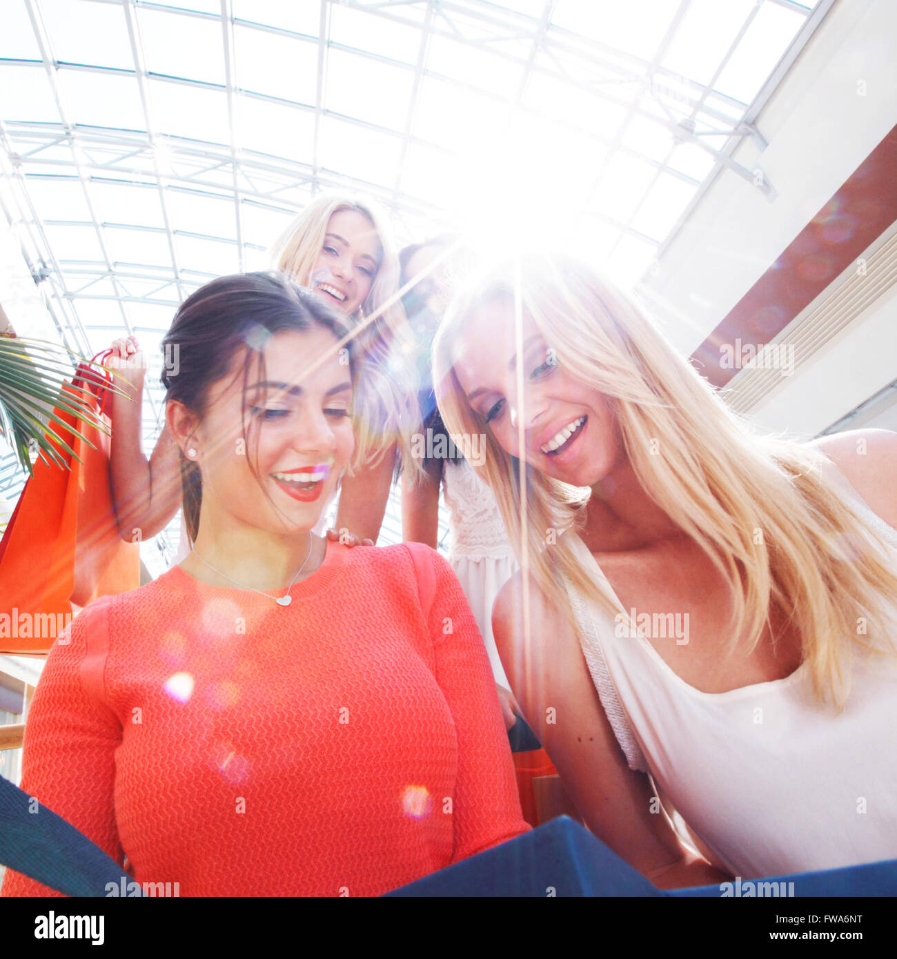 beautiful young women shopping at mall Stock Photo - Alamy