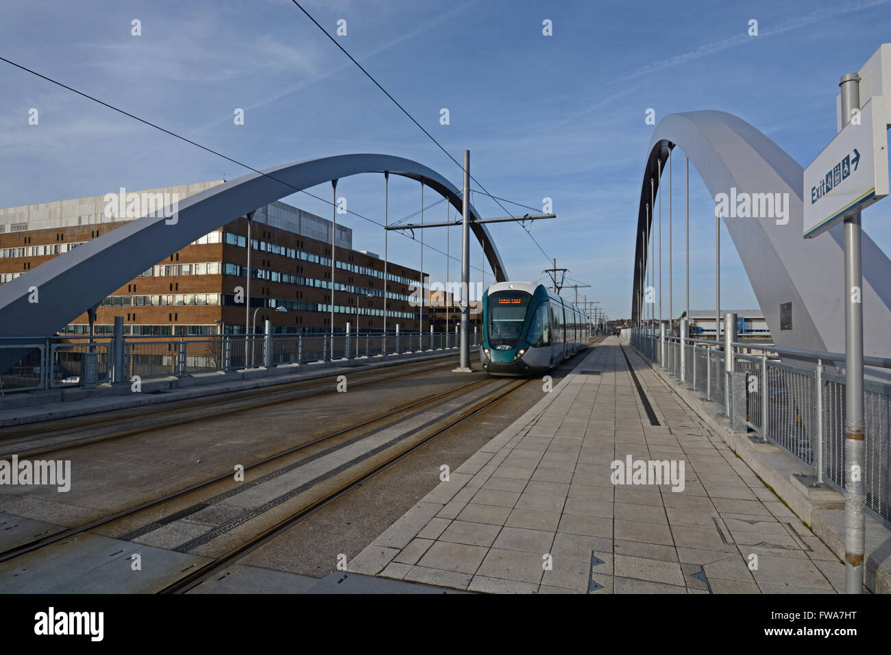 Tram on bridge over ring road, Nottingham Stock Photo - Alamy