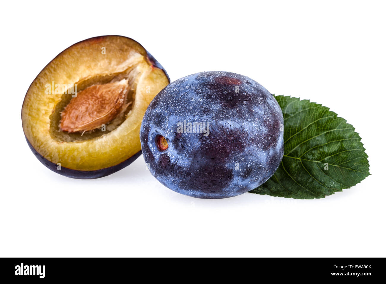 Two ripe plums half hi-res stock photography and images - Alamy