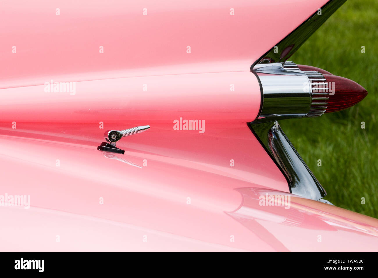 1959 Pink Cadillac. Sharp tail fin with dual bullet tail lights Stock ...