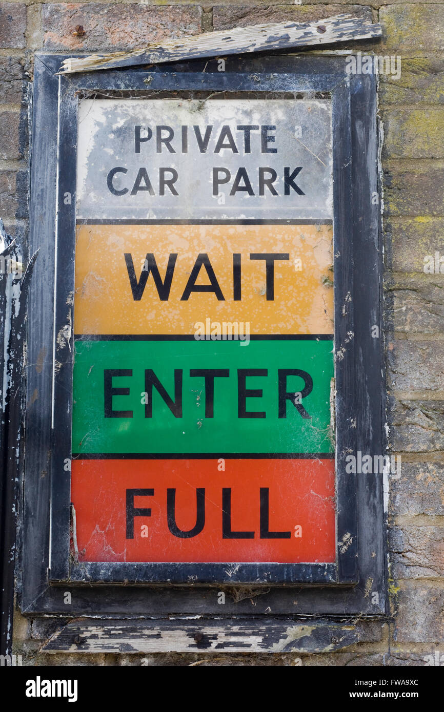 Old damaged car park sign Stock Photo - Alamy