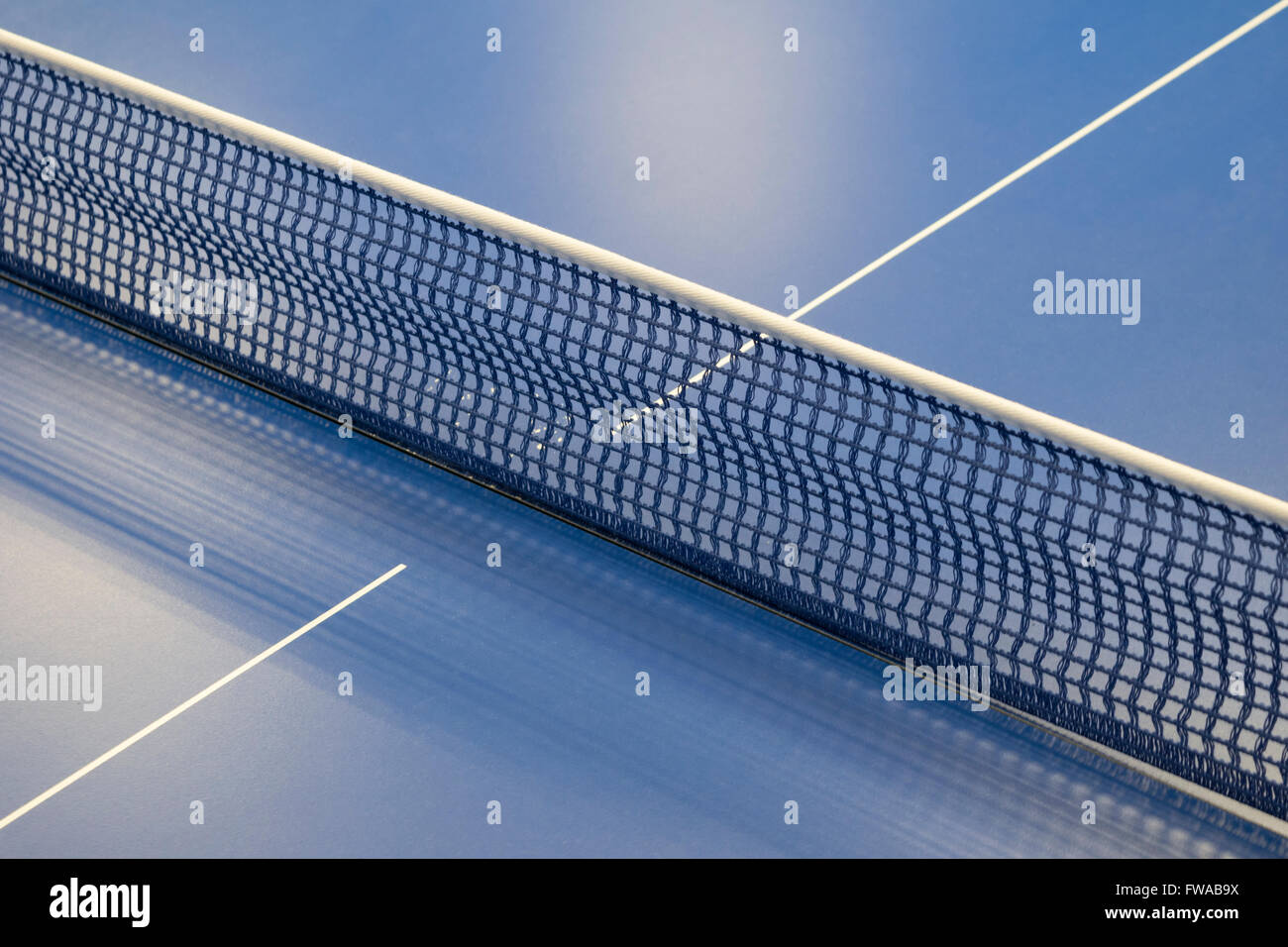 blue net for pingpong and a tennis table Stock Photo - Alamy
