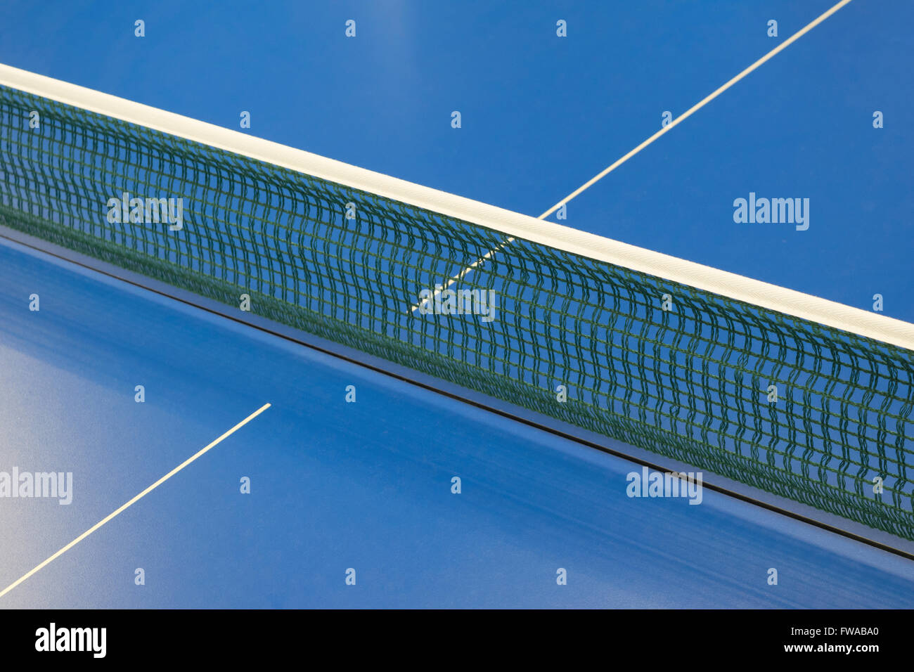 green net for pingpong and blue tennis table Stock Photo - Alamy