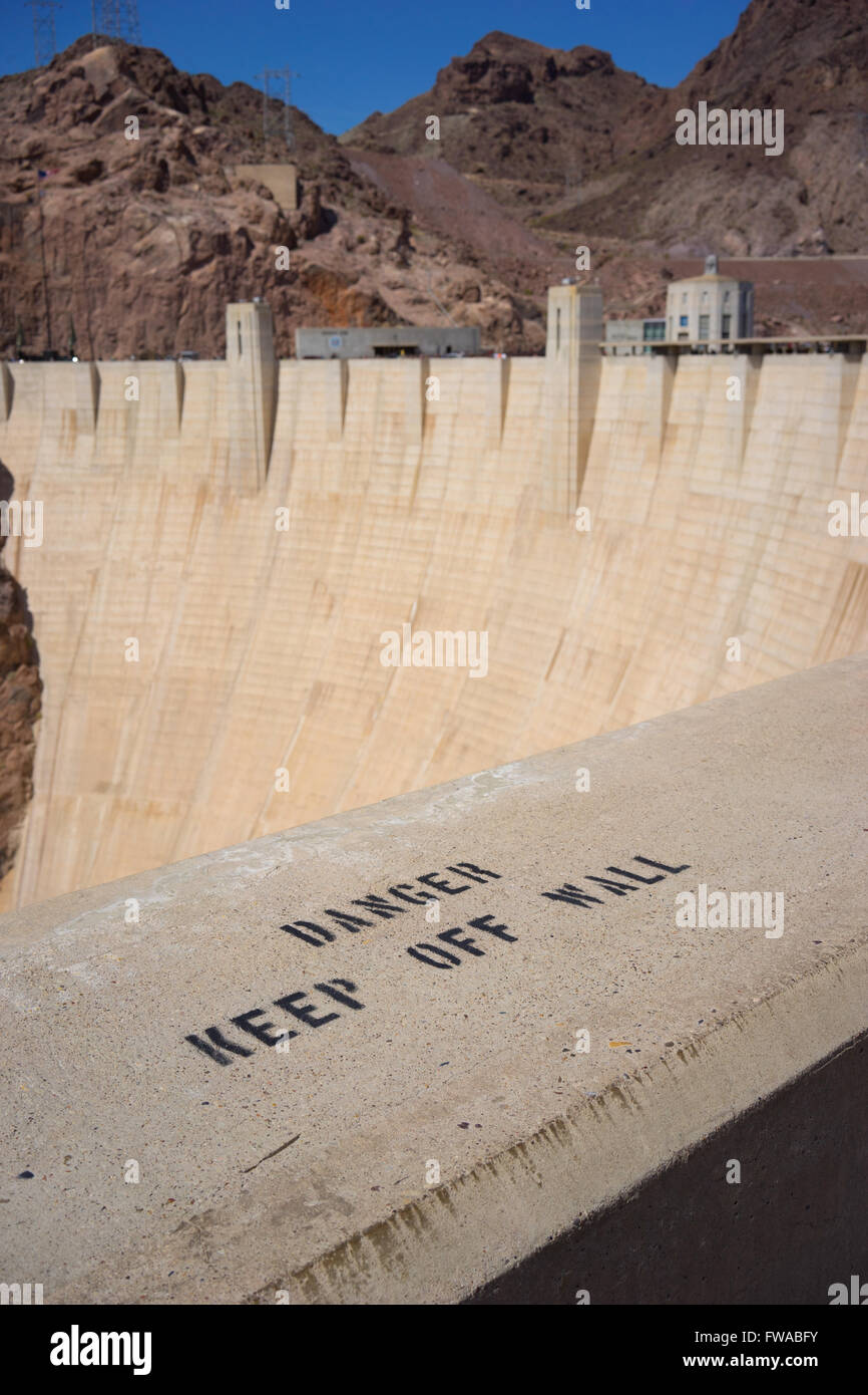 Danger sign on the wall of the historic Hoover Dam on the border of ...