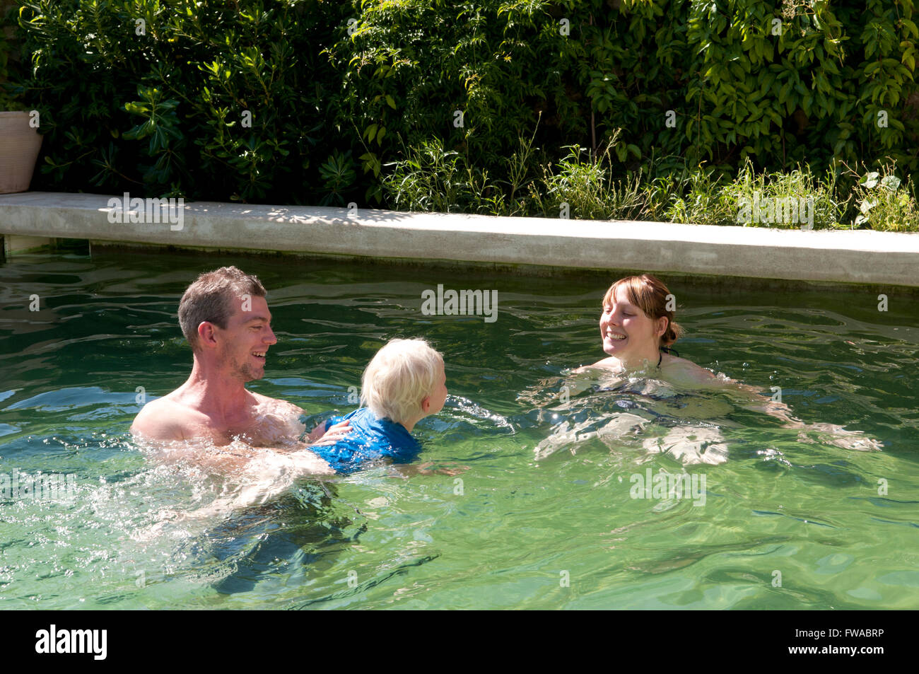 Family swimming pool hi-res stock photography and images - Alamy