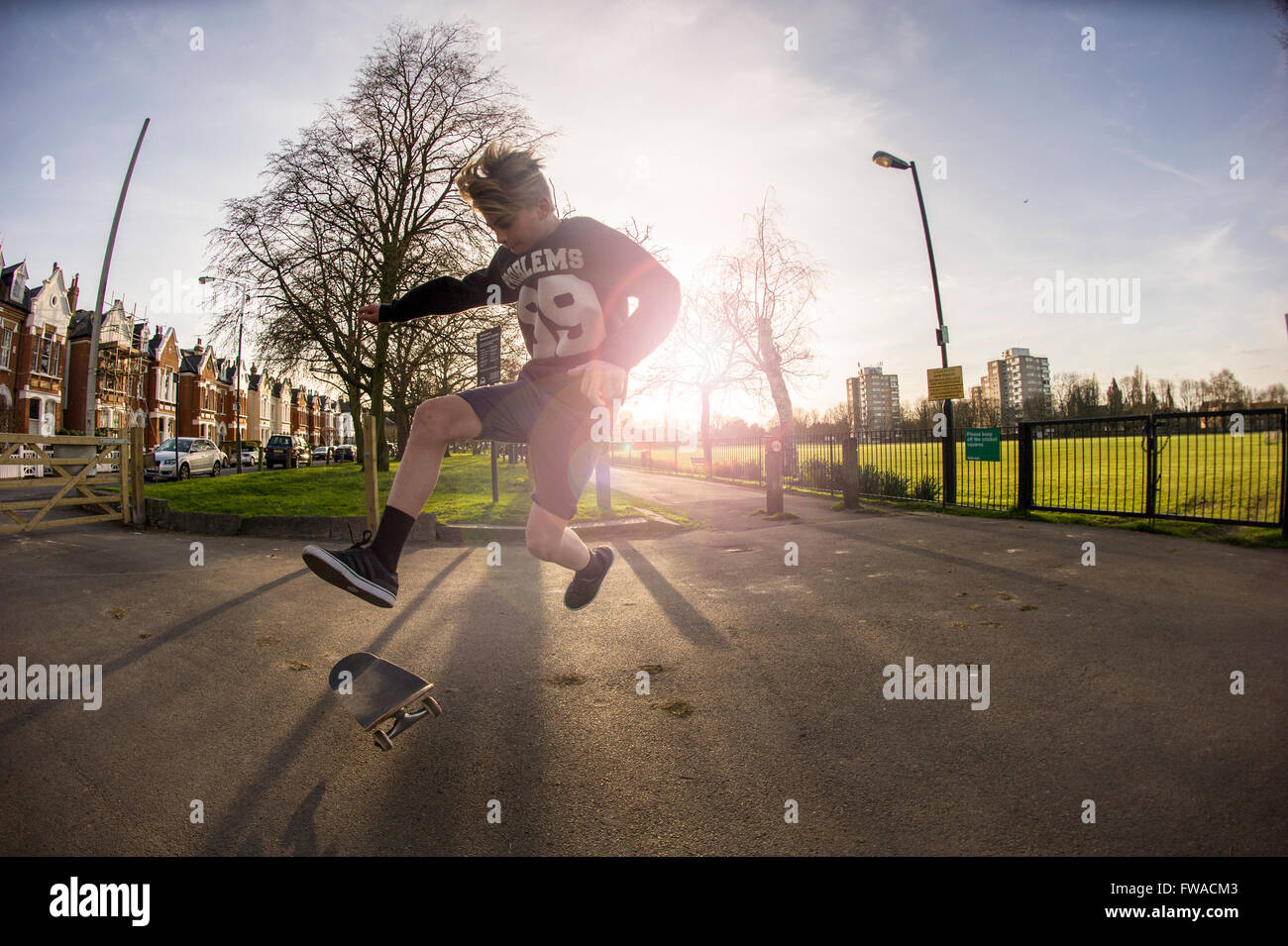 Skateboarding on a sunny spring day in a London park Stock Photo - Alamy