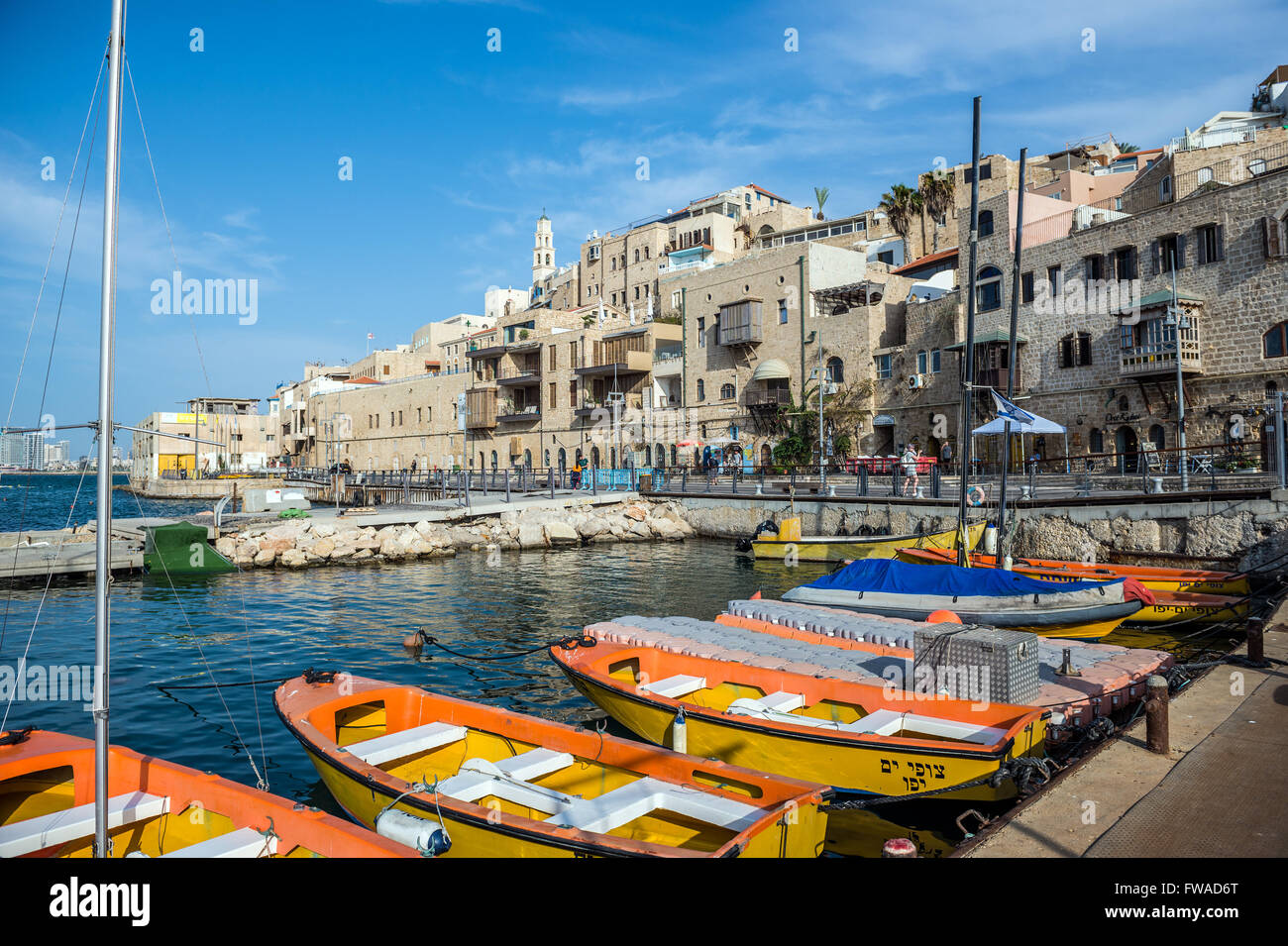 fishing boats and apartment houses in port of Jaffa, oldest part of Tel ...
