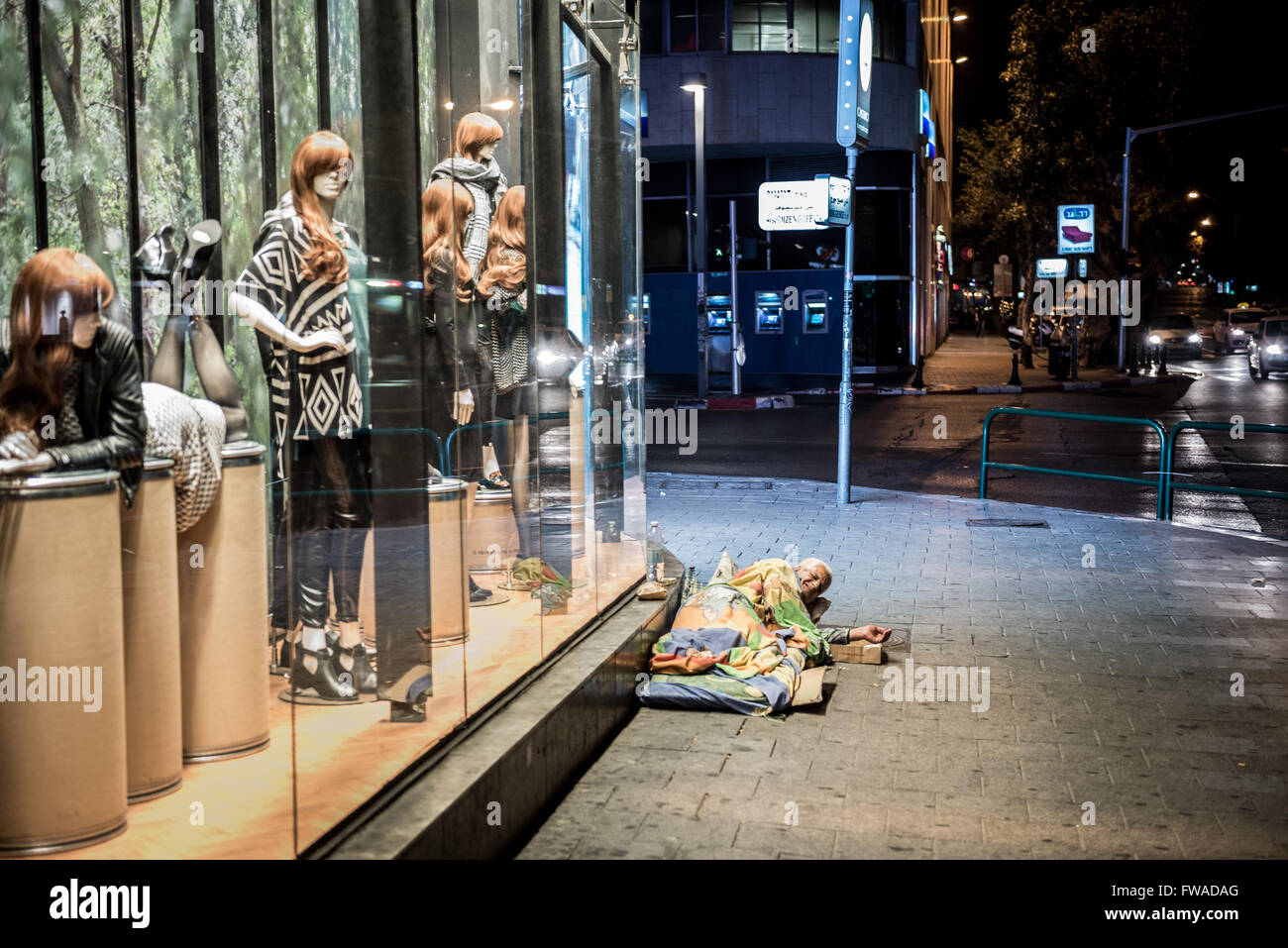 homeless man in front of clothes shop in Tel Aviv city, Israel Stock ...