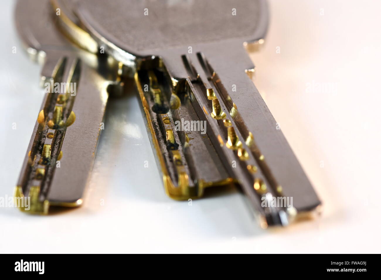 Close up keys and lock Cylinder Stock Photo - Alamy