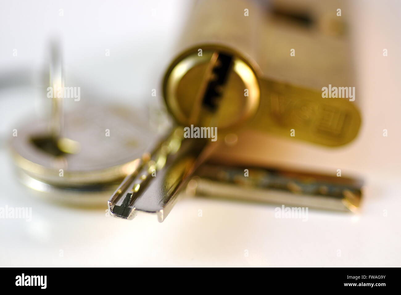 Close up keys and lock Cylinder Stock Photo - Alamy