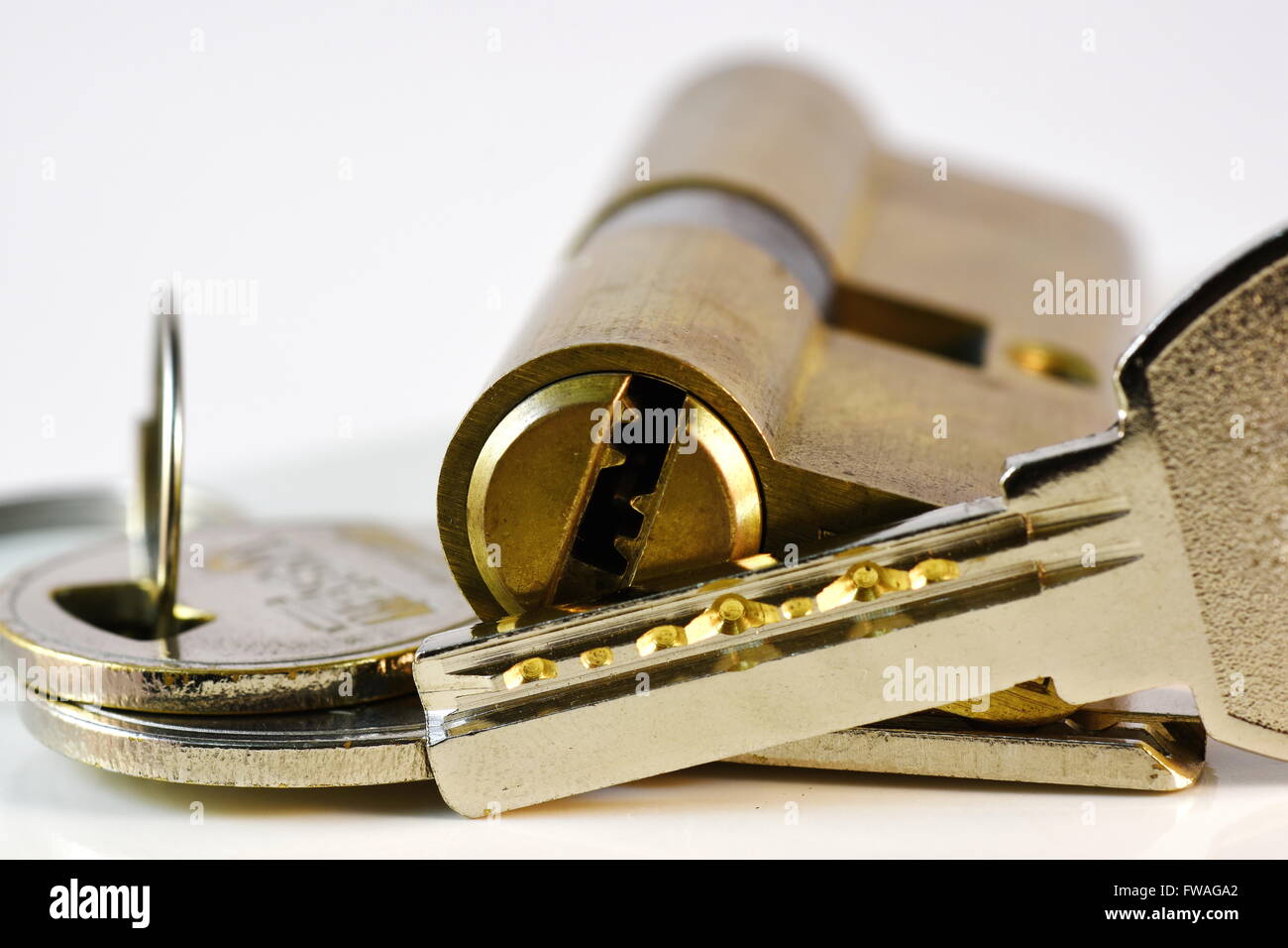 Close up keys and lock Cylinder Stock Photo - Alamy