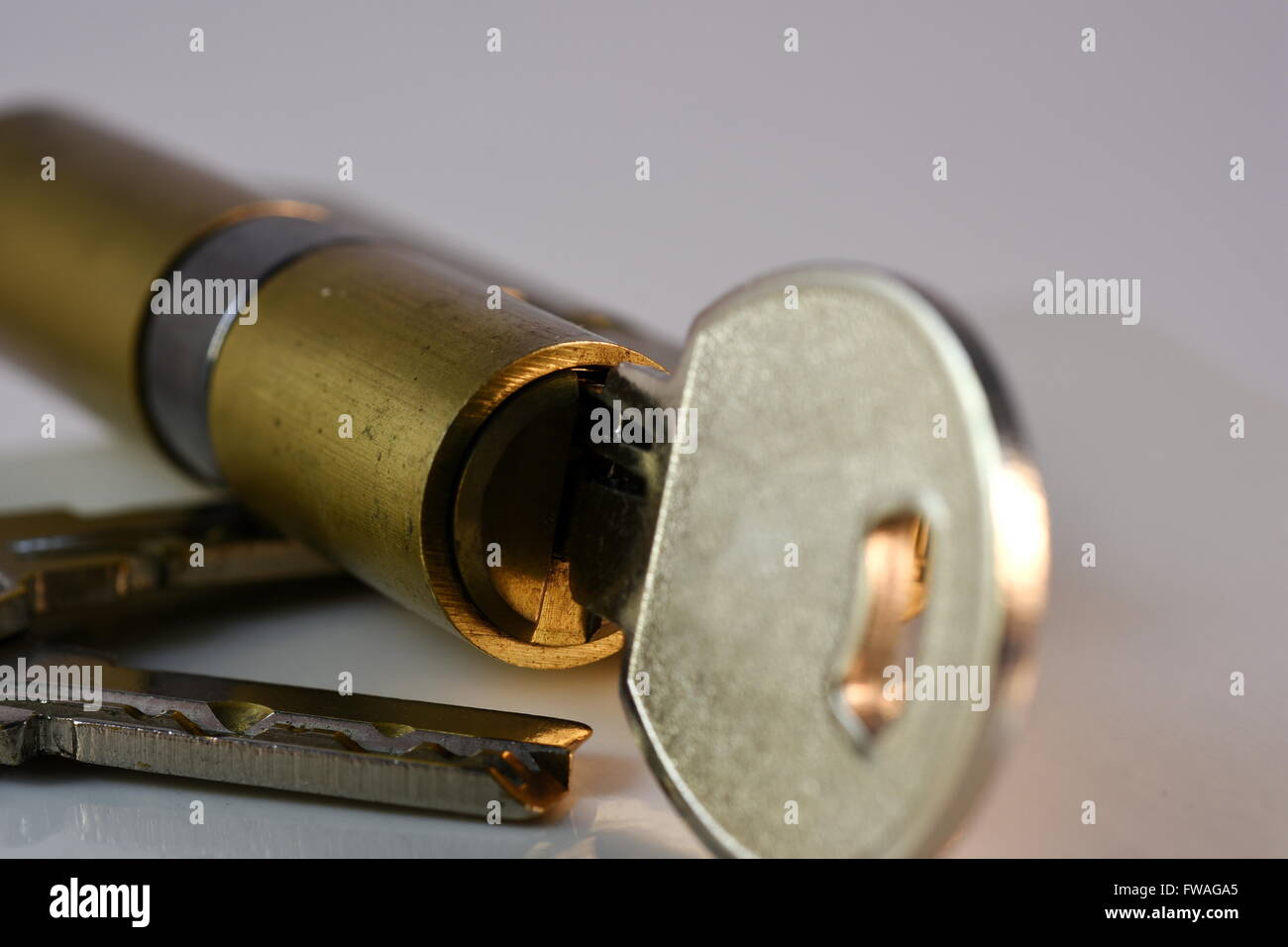Close up keys and lock Cylinder Stock Photo - Alamy