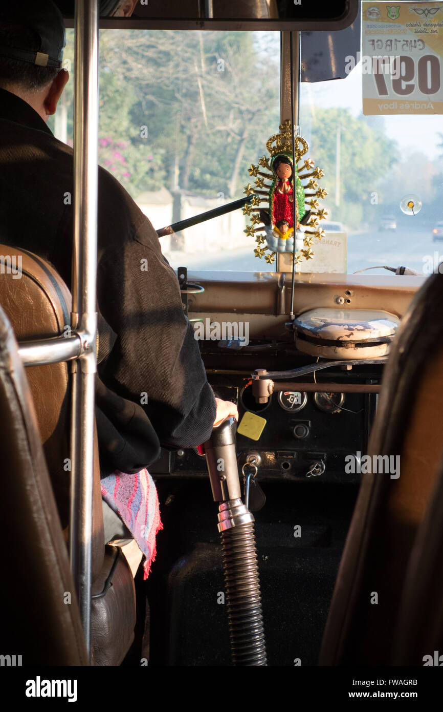 Virgin Mary papier mache good luck charm for driver of chicken bus in ...