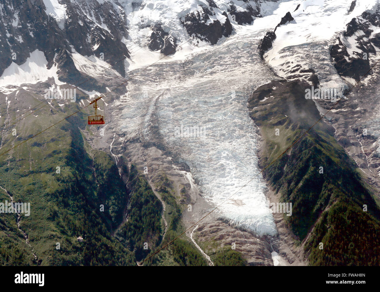 The Brevent cable car passes in front of Glacier des Bossons, Chamonix ...