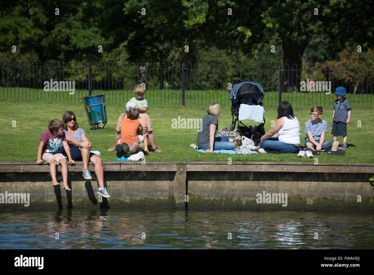 Father children on riverbank hi-res stock photography and images - Alamy