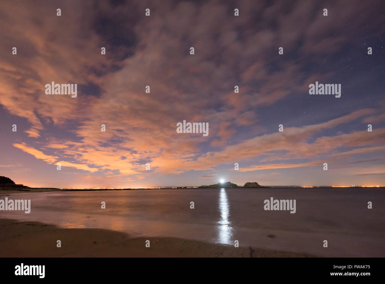 Fidra island and night sky over the Firth of Forth estuary, East ...