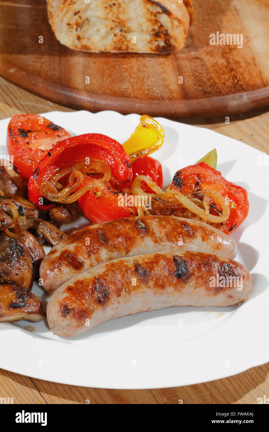 Delicious grilled sausages served hi-res stock photography and images ...