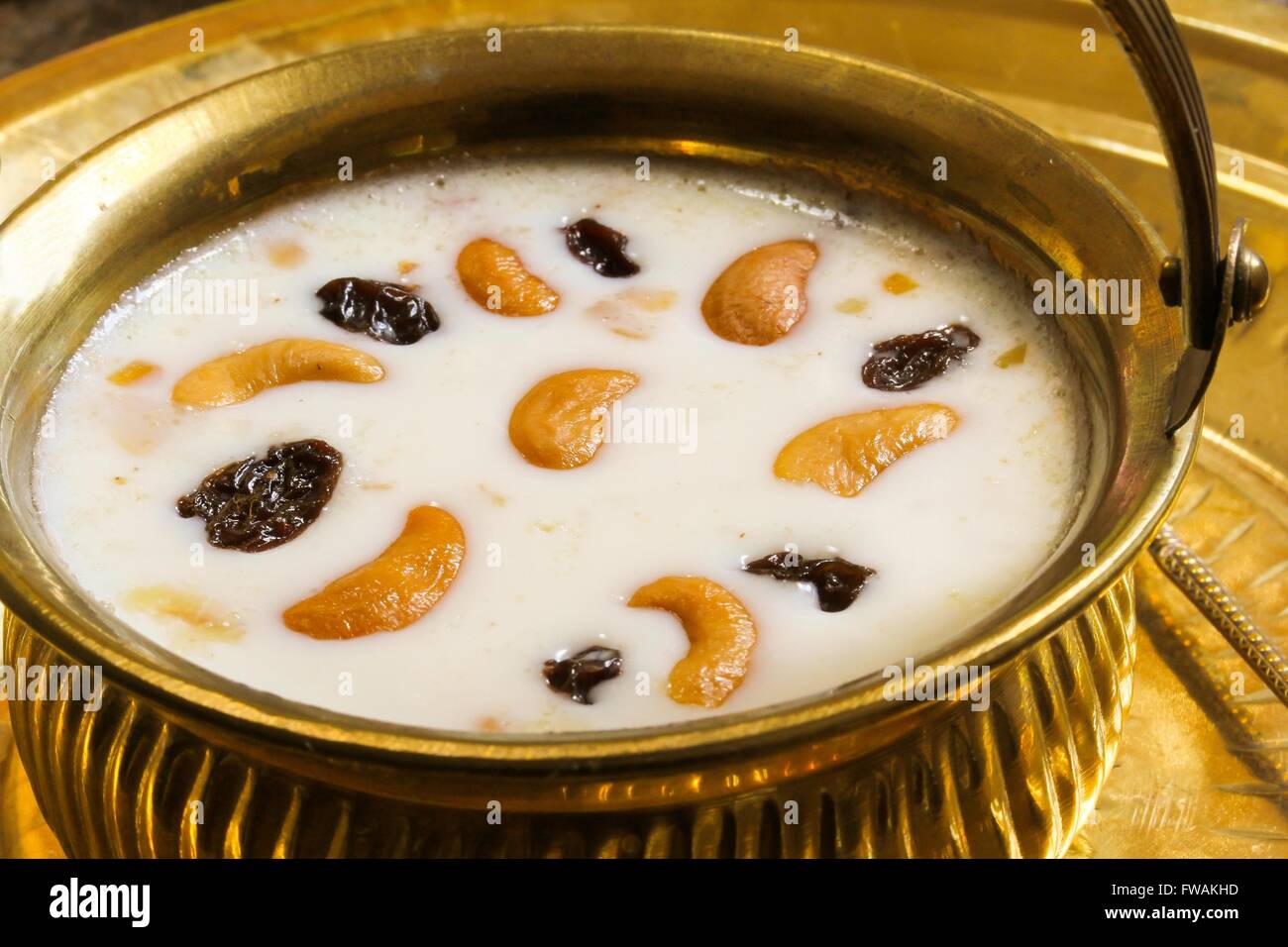 Indian Rice pudding payasam decorated with Cashews and raisin in a ...