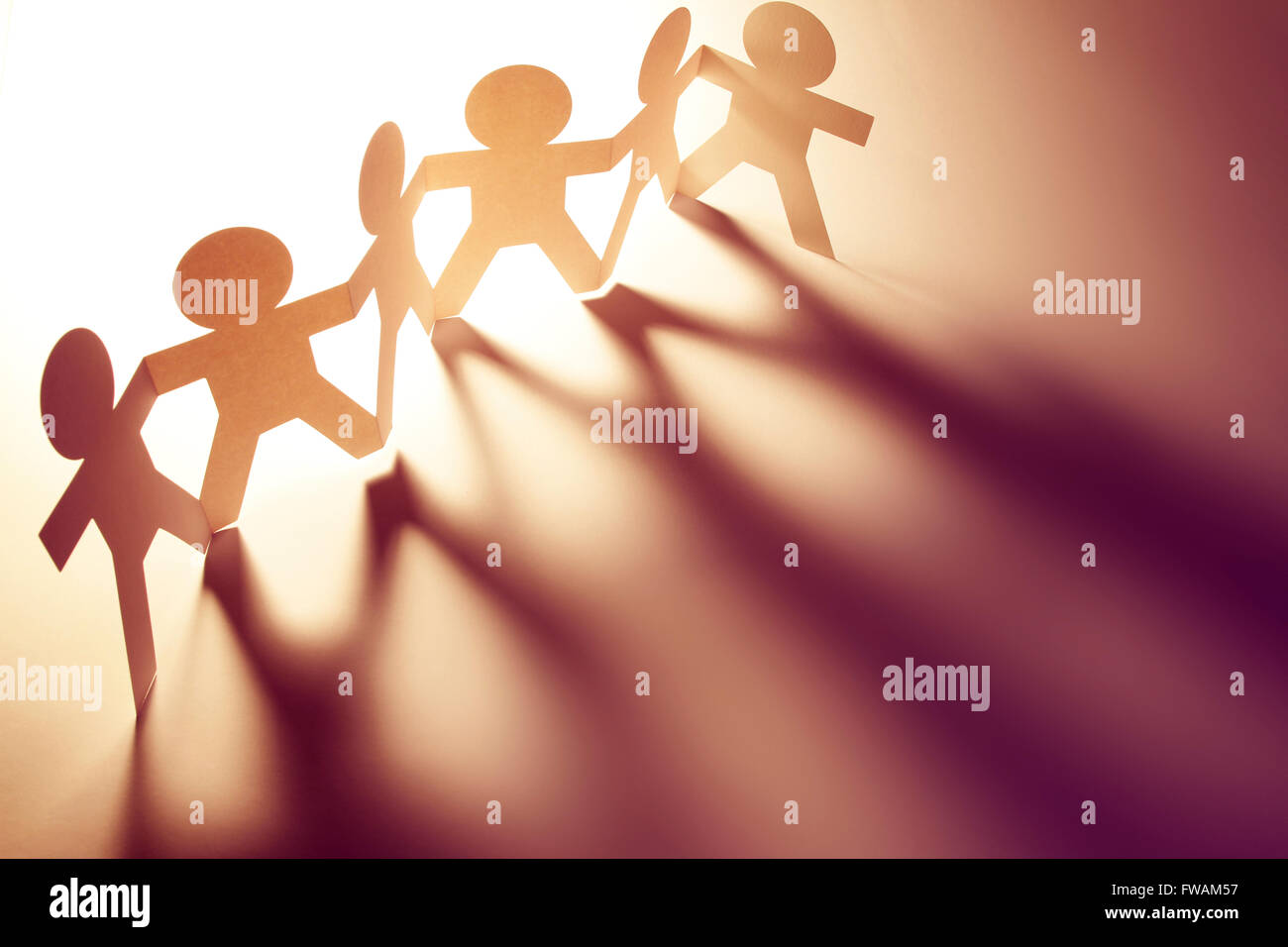 Team of paper doll people Stock Photo - Alamy