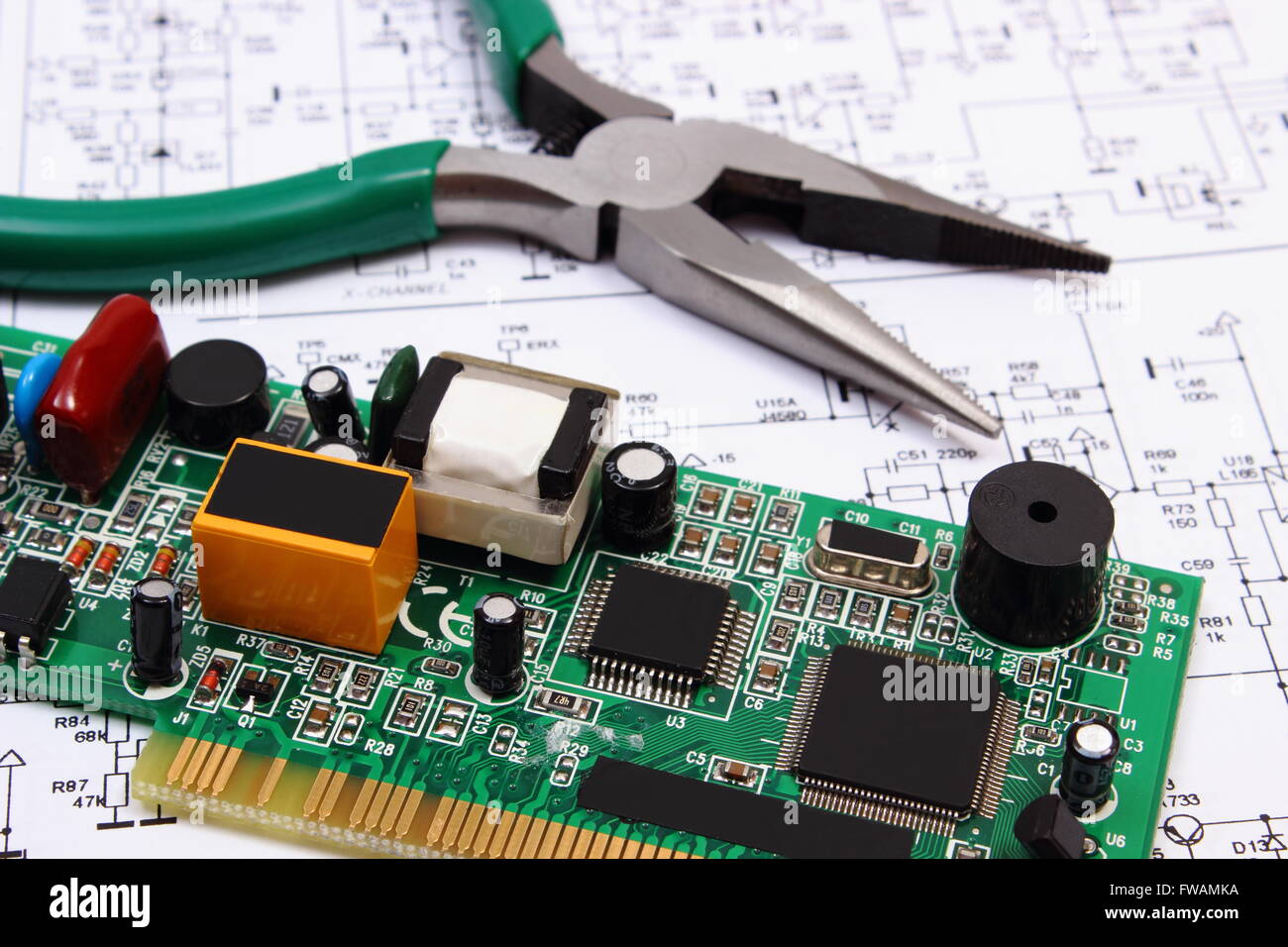 Printed circuit board with electrical components and precision tools ...