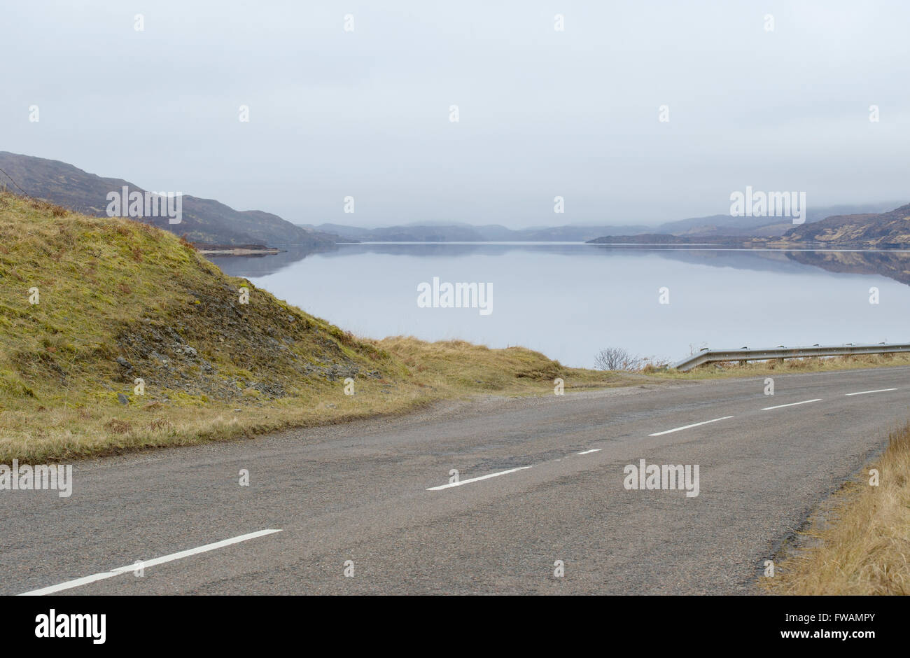 Empty road leading into the distant hills, Scottish Highlands, North ...