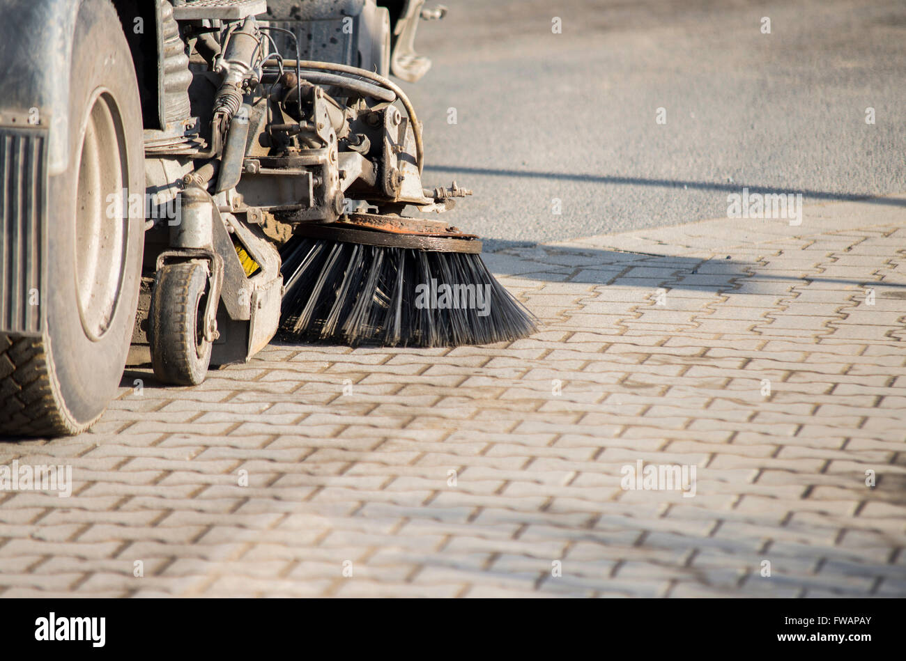 Street sweeper machine cleaning the street Stock Photo - Alamy