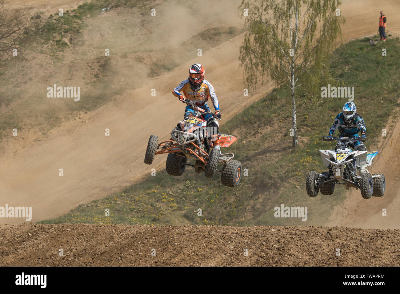 Motorbike jumping two riders hi-res stock photography and images - Alamy