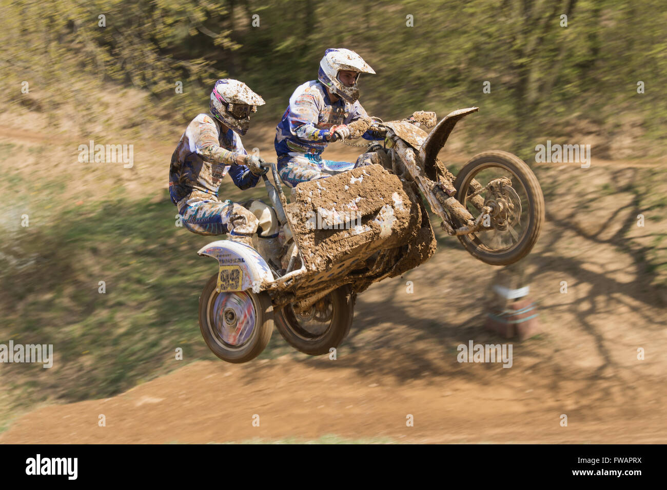 Two racers are jumping a sidecar in the sidecars race Stock Photo - Alamy