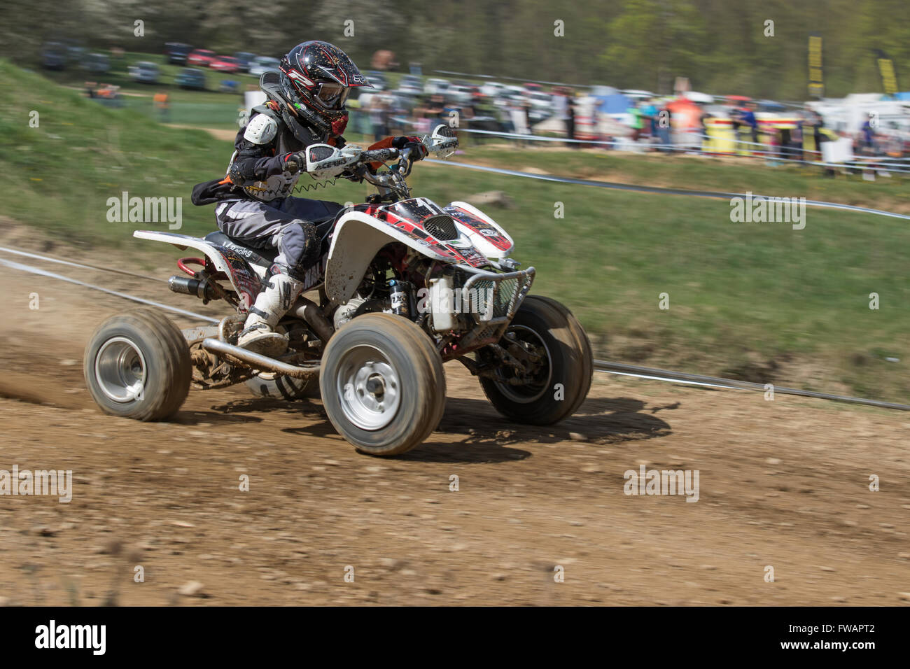 Dynamic shot of young quad rider in the race Stock Photo - Alamy