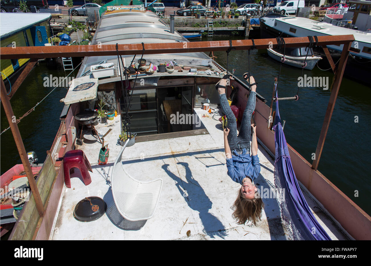 Dutch girl living on a houseboat in Amsterdam Stock Photo - Alamy