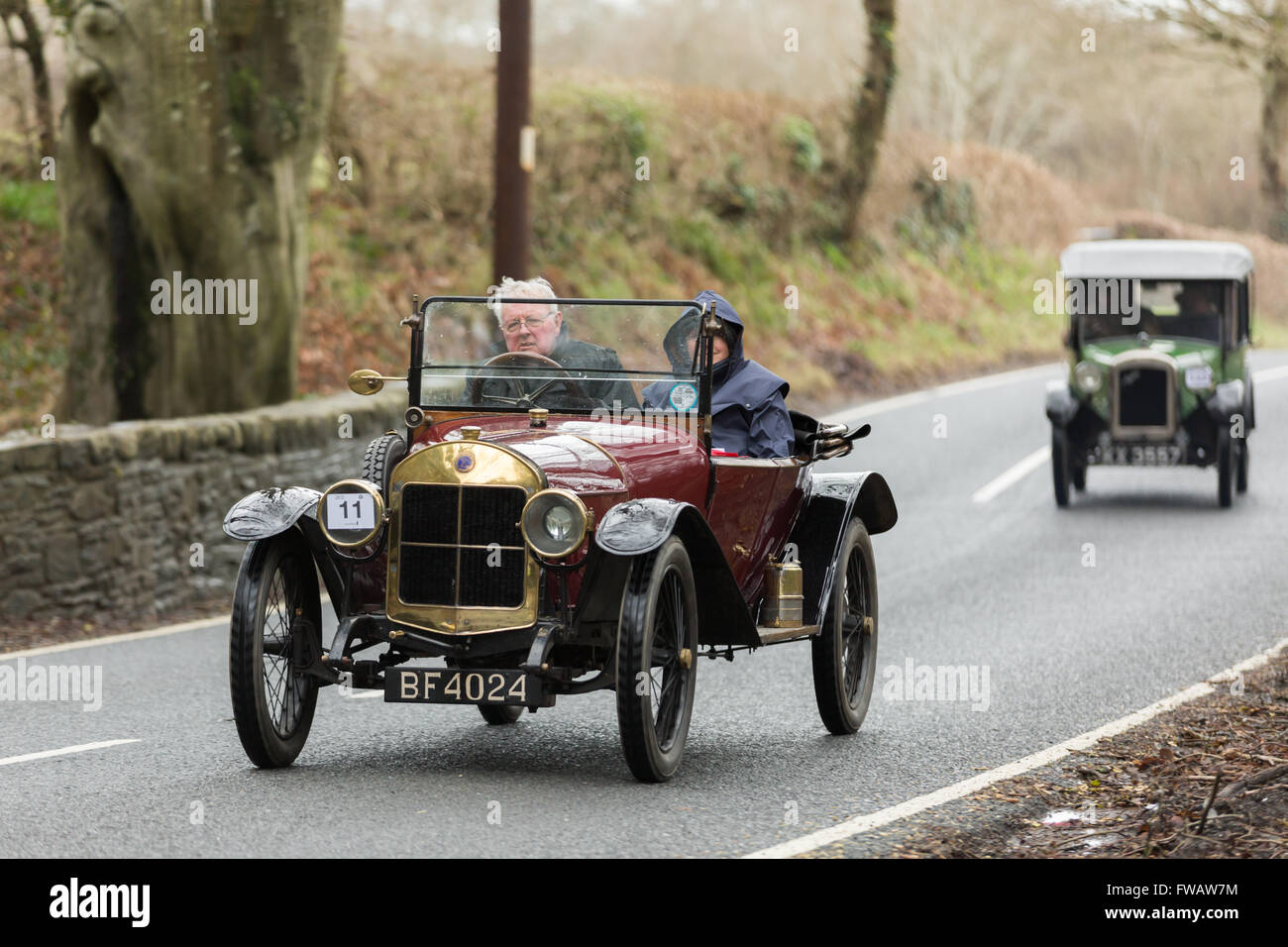 People driving vintage cars Stock Photo - Alamy