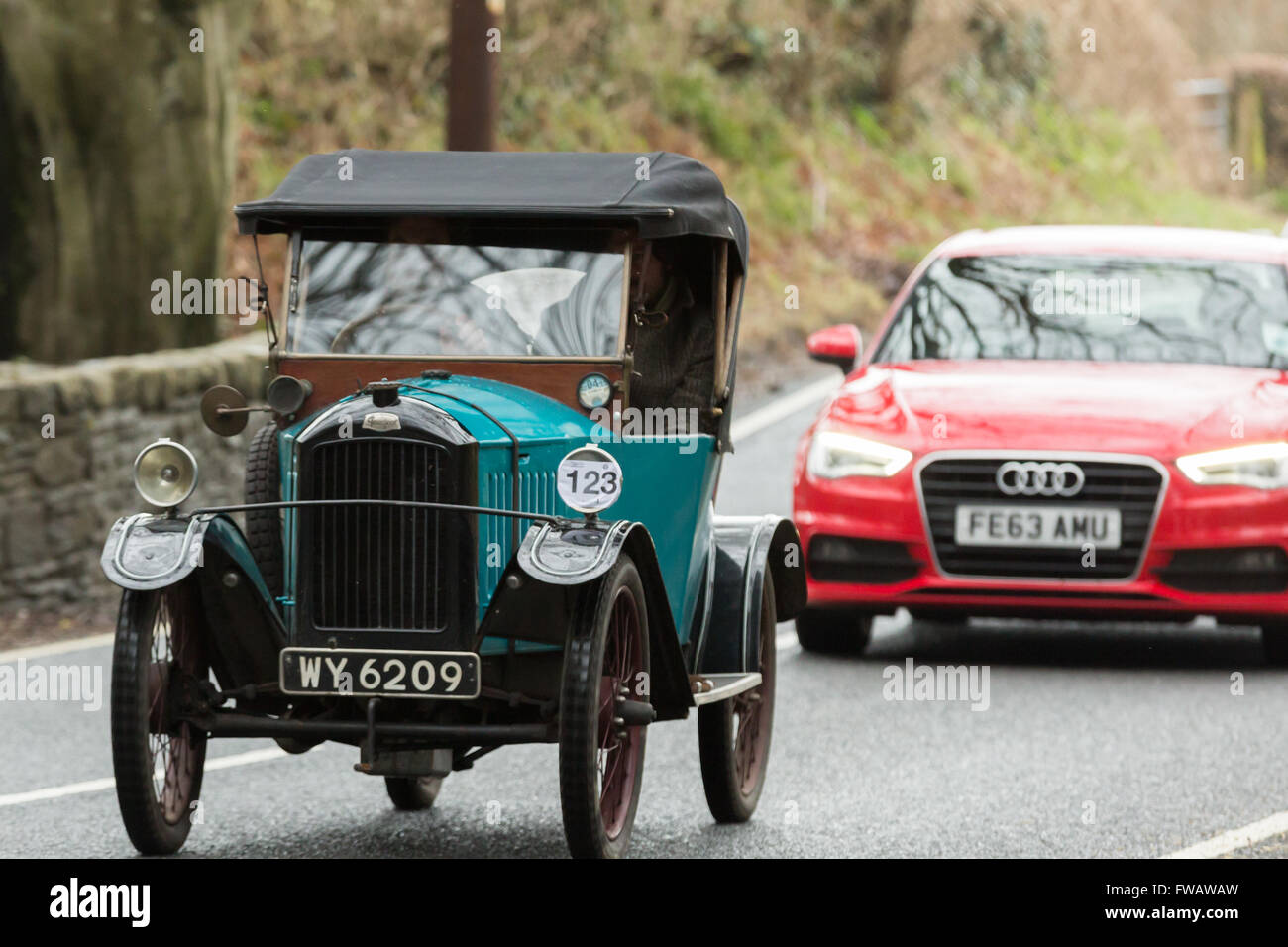 People driving vintage cars Stock Photo - Alamy