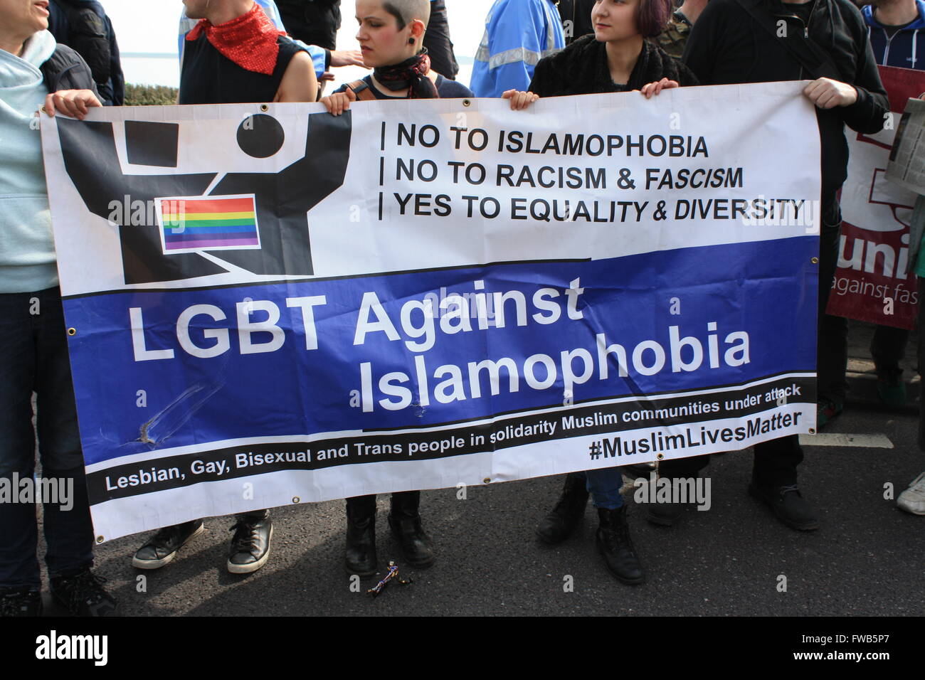 Dover, UK. 02nd Apr, 2016. A banner is held which reads "LGBT Against ...