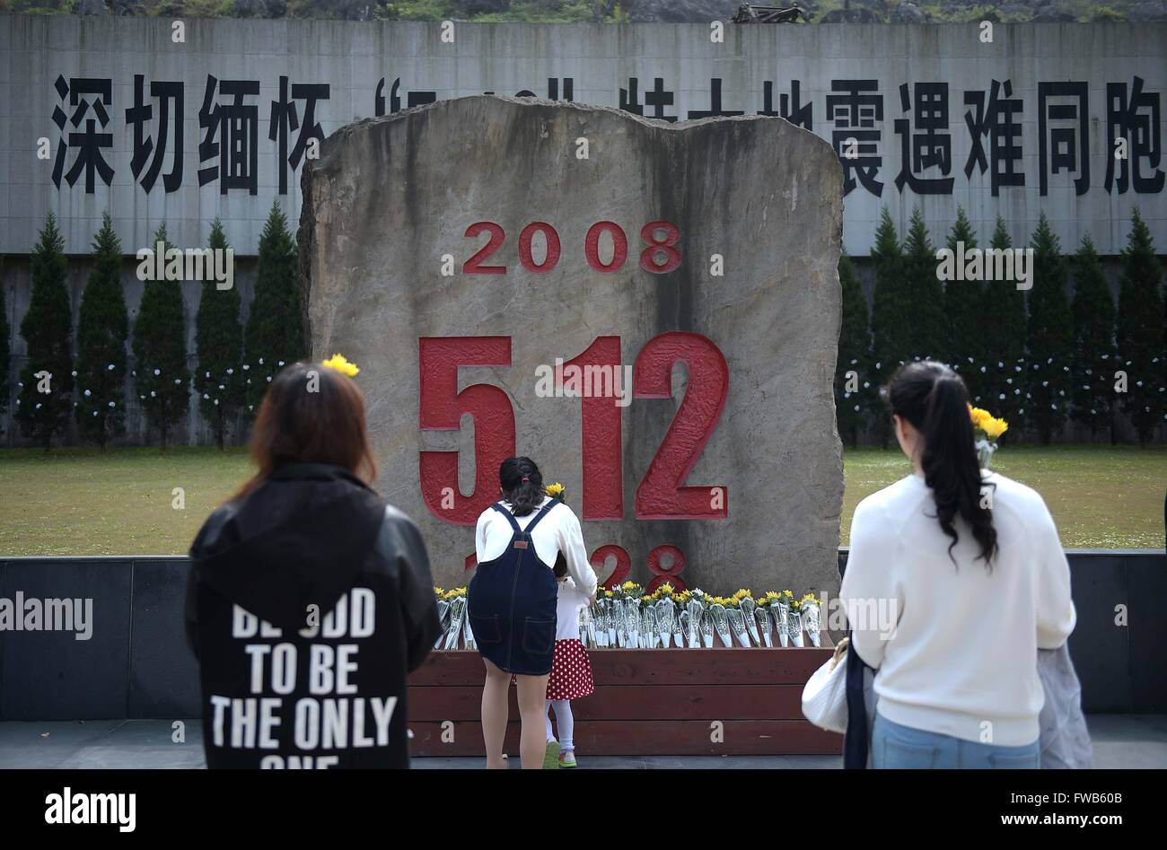 Beichuan, China's Sichuan Province. 3rd Apr, 2016. People lay flowers ...