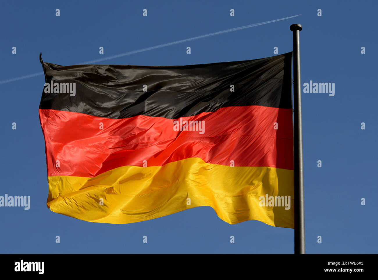 The German flag in front of the Reichstag building in Berlin, Germany 2 ...