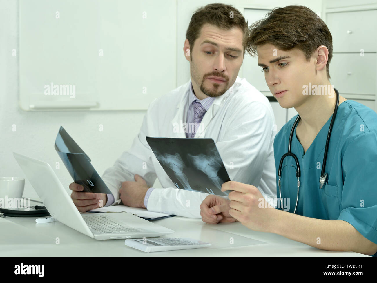 male doctors in medical office Stock Photo - Alamy