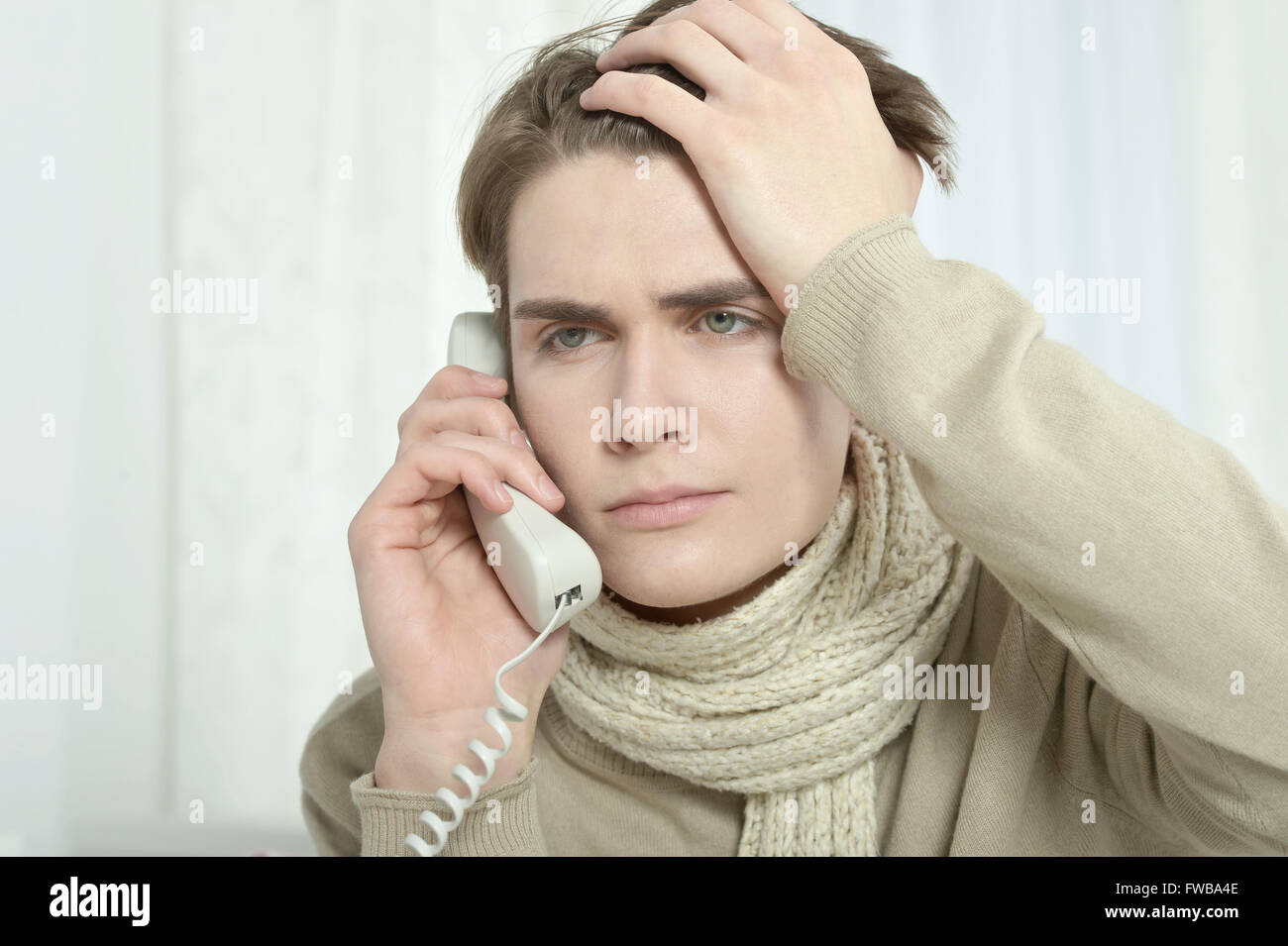 sick man calling his doctor Stock Photo - Alamy