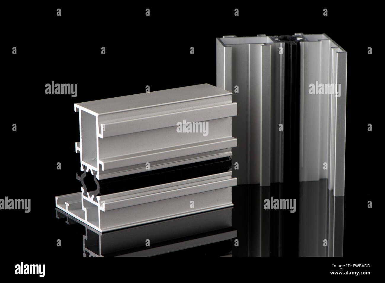 Aluminium profile sample isolated on black background Stock Photo - Alamy